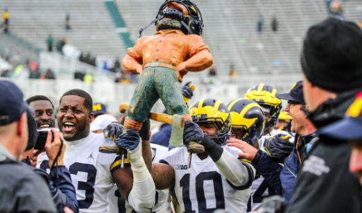 Michigan Stomps On Spartans Logo With Paul Bunyan After Win